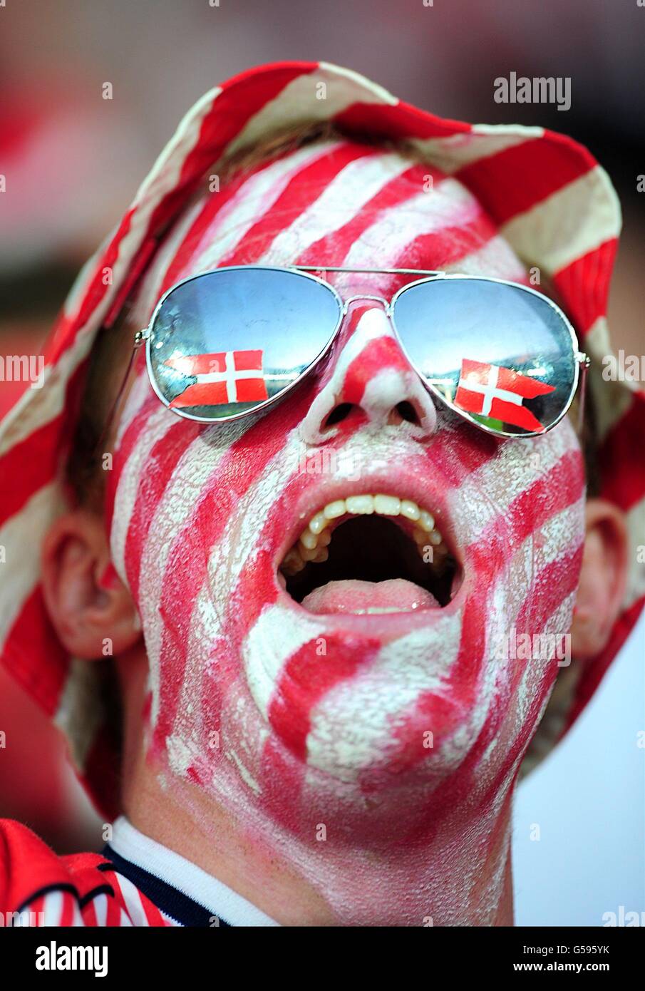 A Denmark fan shows support for his team in the stands Stock Photo - Alamy
