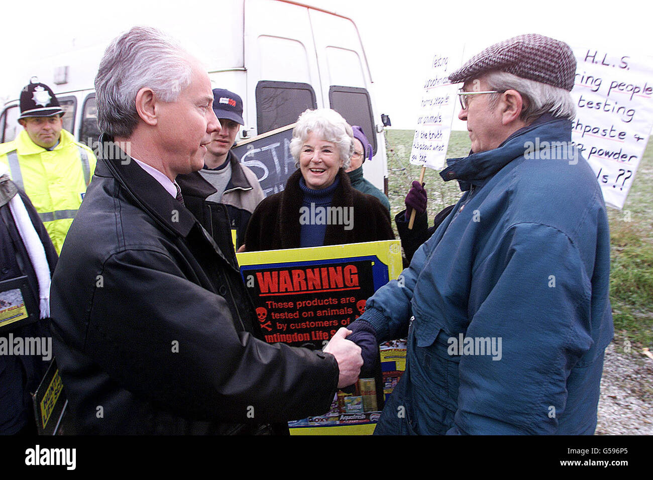 Politics protest police placards shaking hands hi-res stock photography ...
