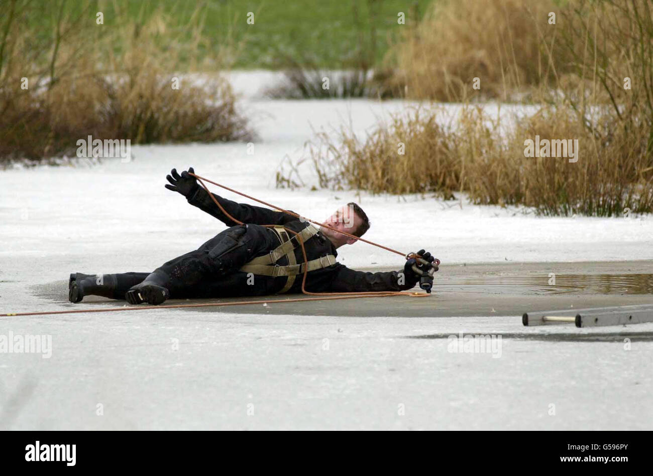 Scotland frozen pond death Stock Photo - Alamy