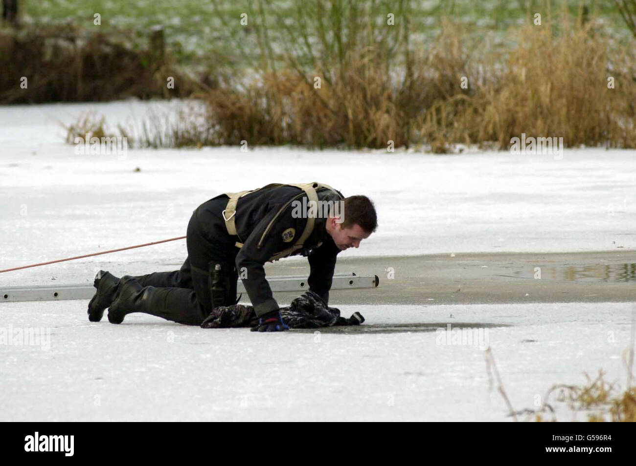 Scotland frozen pond death Stock Photo - Alamy