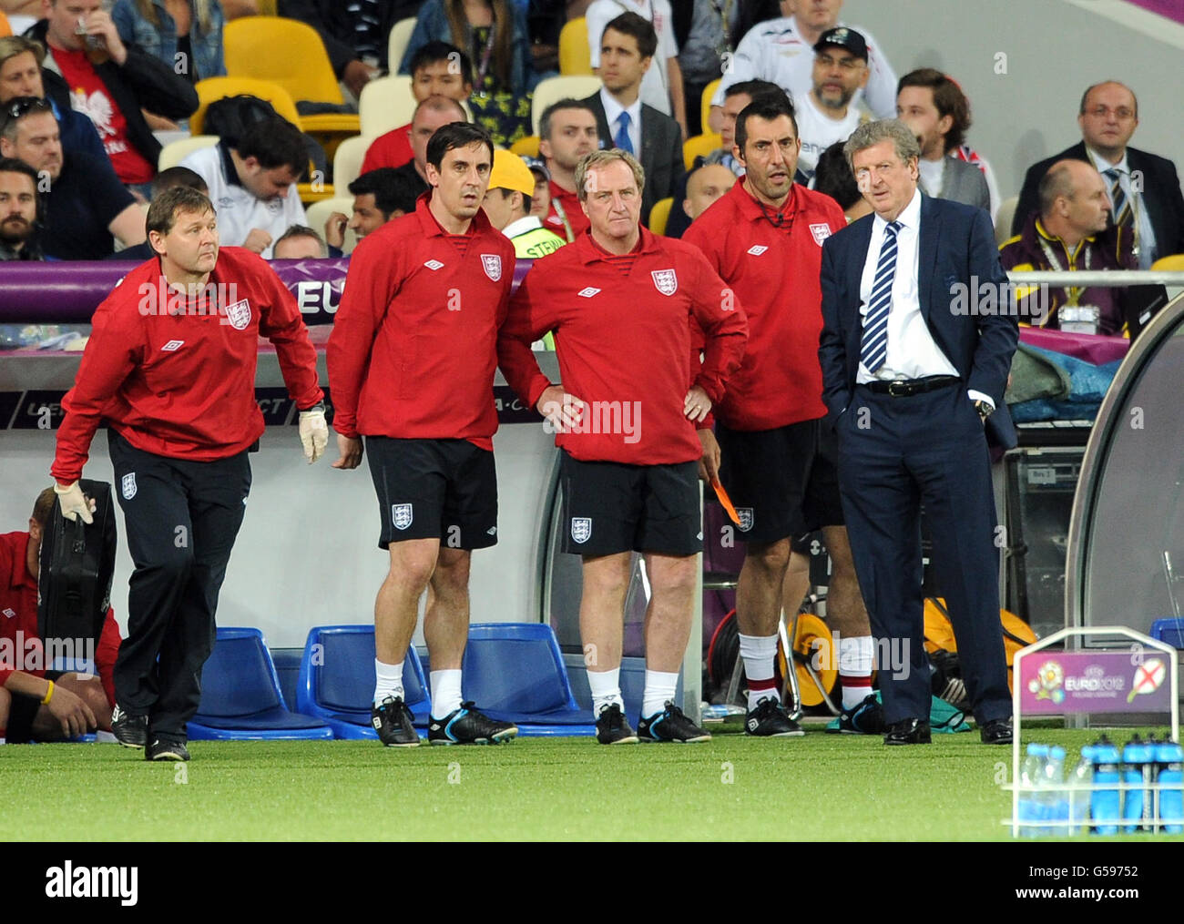 The England bench look on during the group D match between Sweden and ...