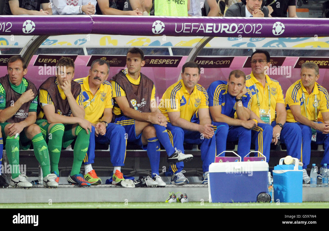 Ukraine's Andrei Shevchenko (centre) looks-on from the substitute bench ...