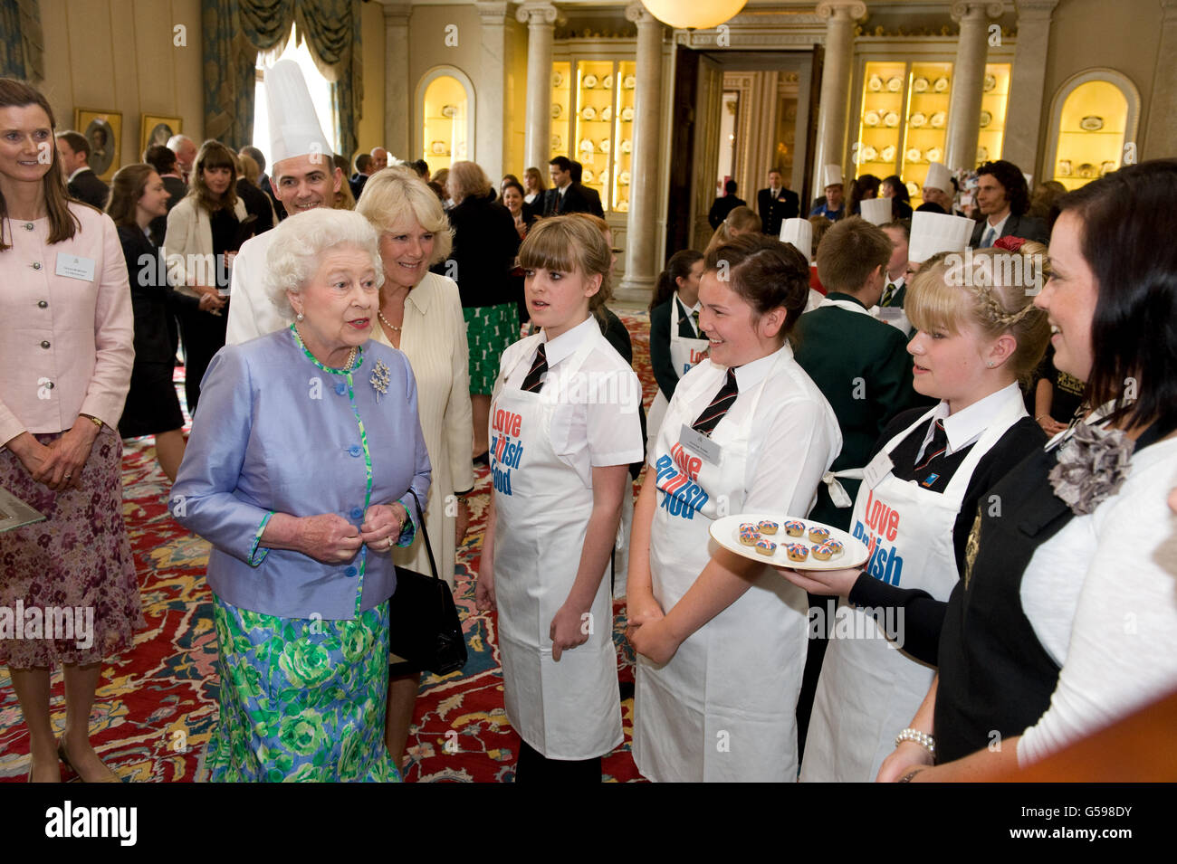 Queen Elizabeth II and The Duchess of Cornwall meet pupils at a ...