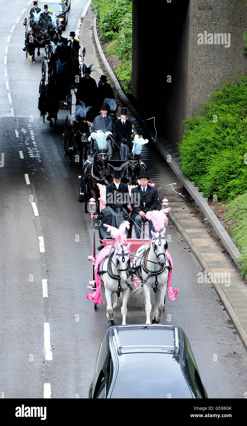 The funeral cortege of the Philpott children on the way to St Mary's RC ...