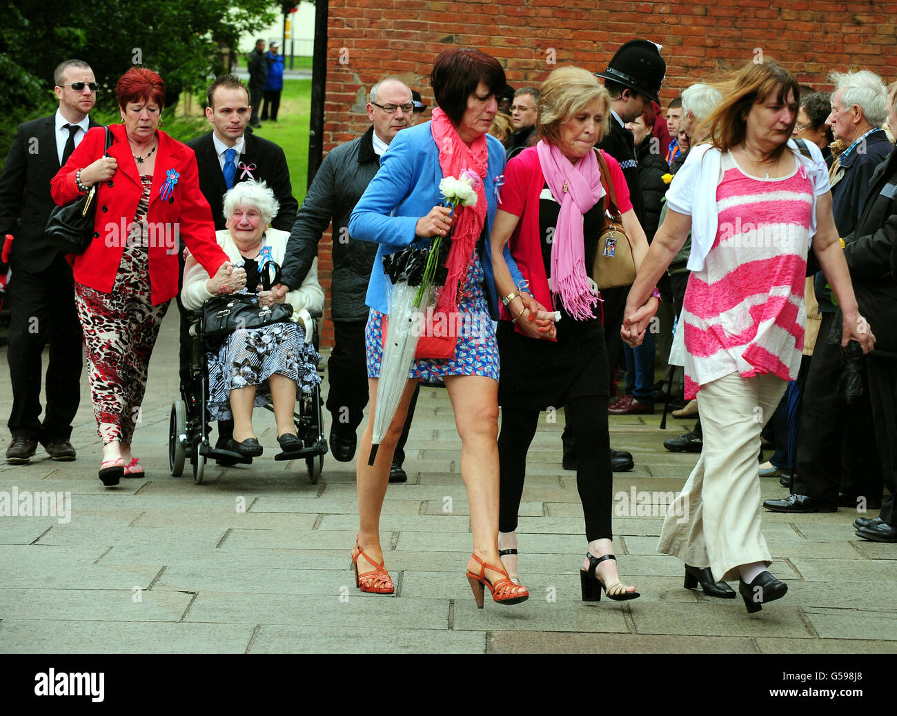Mourners (names not known) arrive for the funeral of the Philpott ...