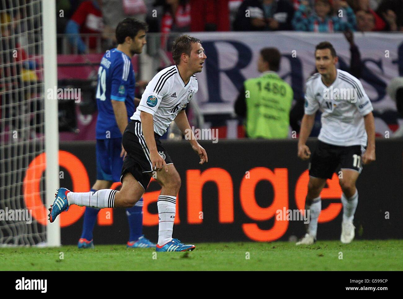 Germany's Philip Lahm celebrates scoring the opening goal of the game ...