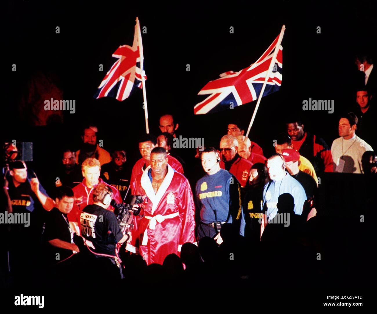 WORLD HEAVYWEIGHT BOXING. FRANK BRUNO ENTERS THE RING FOLLOWED BY A ...