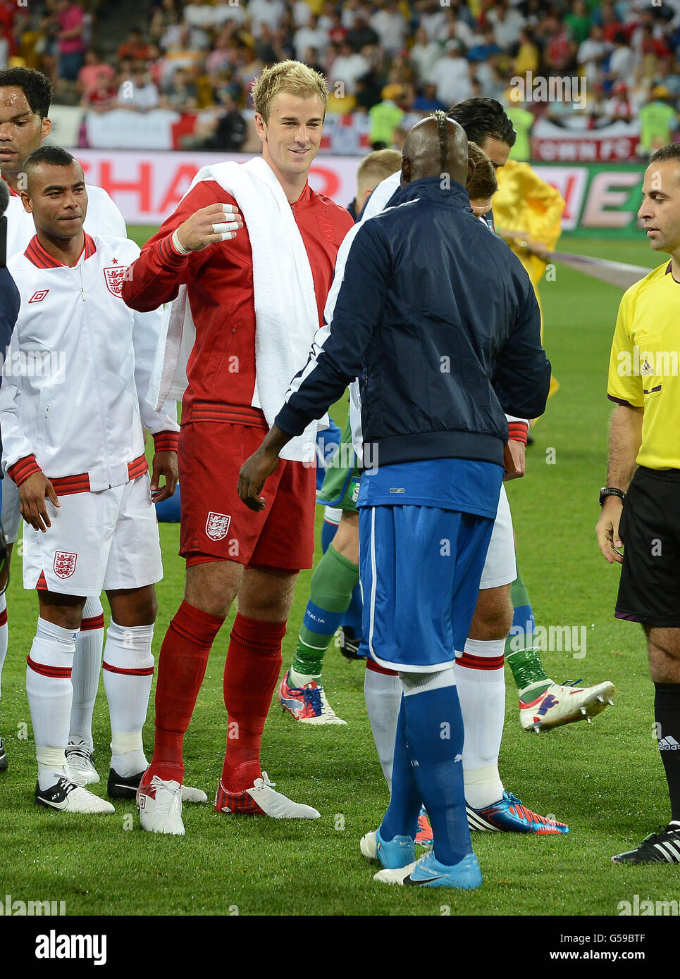 England's Joe Hart about to shake hands with club team mate Italy's ...