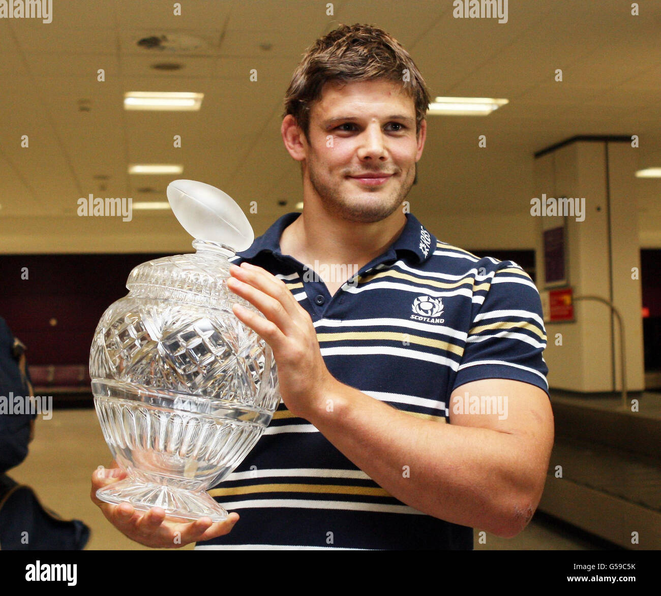 Ross Ford arrives back at Edinburgh Airport after Scotland's southern ...