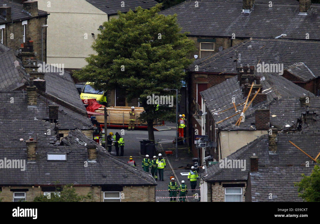 Oldham explosion. Fireman at the scene of a suspected gas explosion in ...