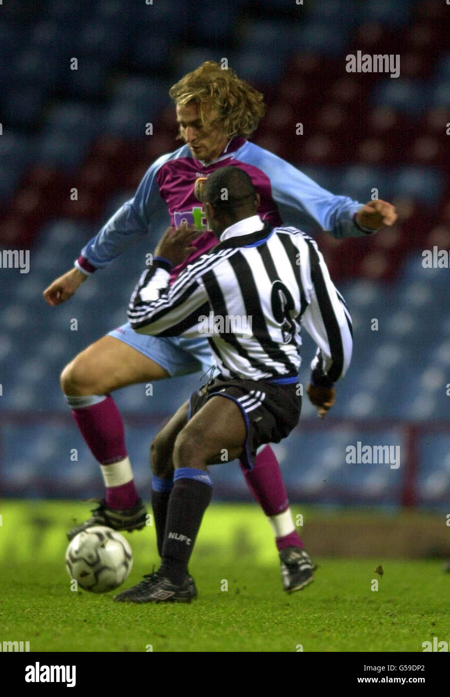 Tackles newcastle uniteds lomana tresor lualua hi-res stock photography ...