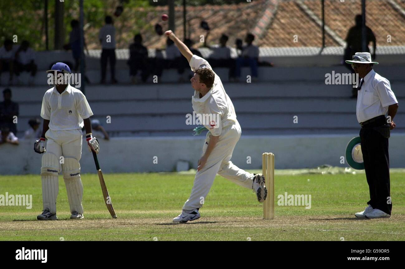 England bowler Robert Croft (centre) bowls, during the tour match ...