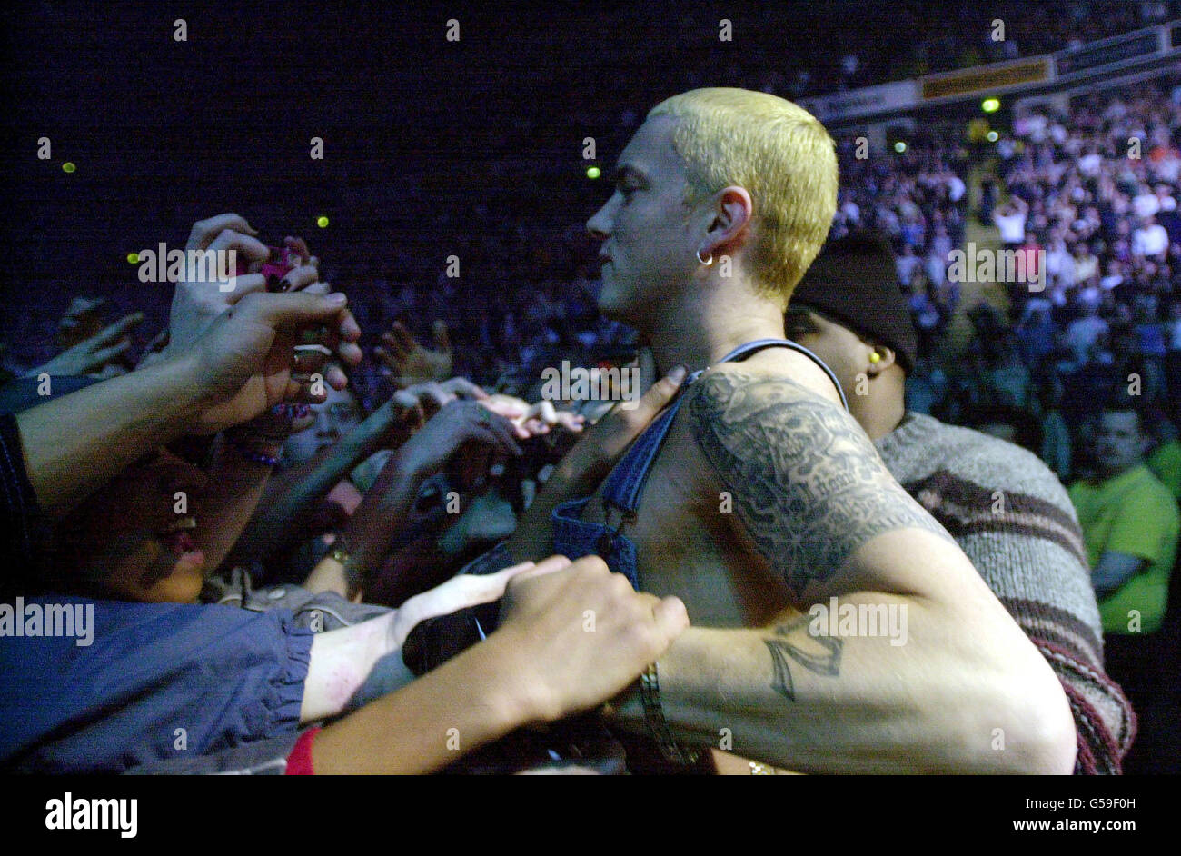 American rap singer eminem goes into the crowd hi-res stock photography ...