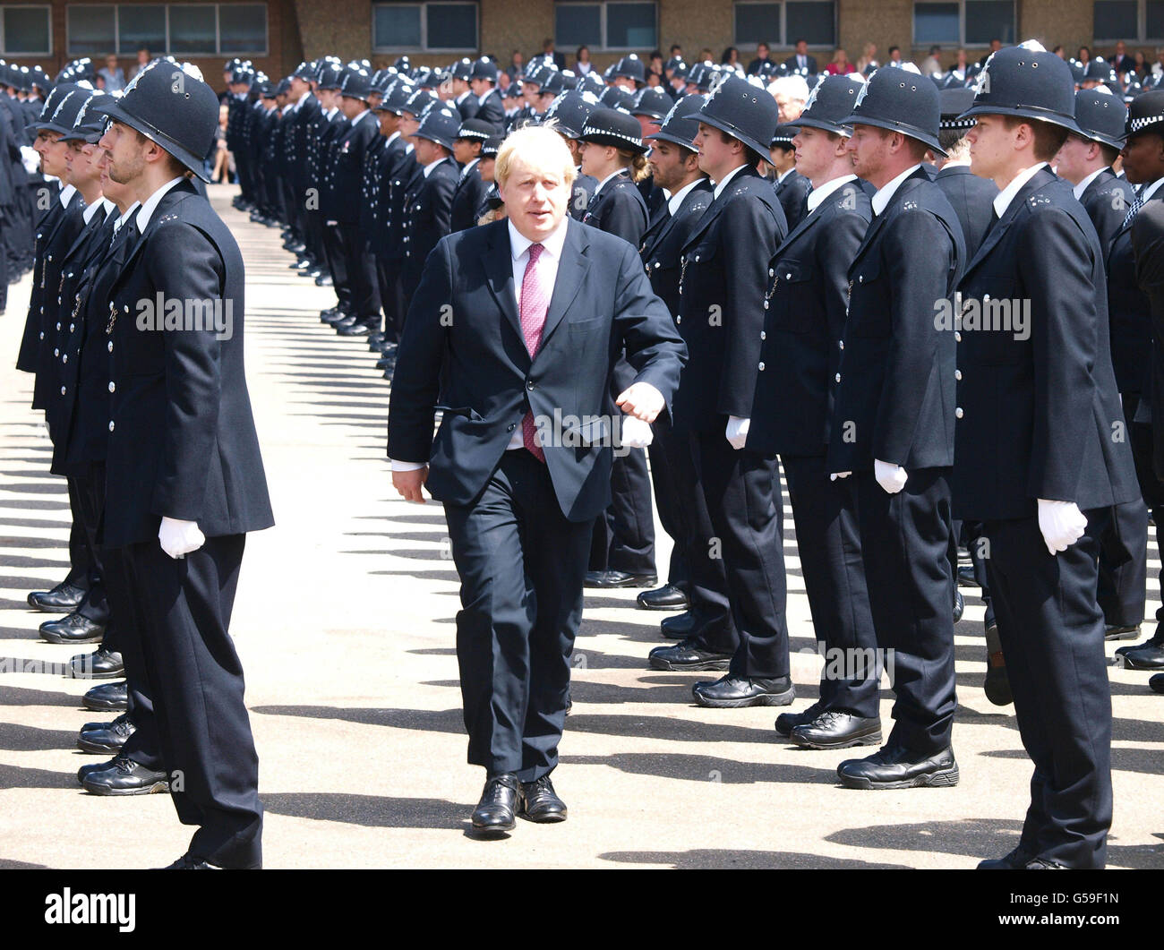 Mayor Boris Johnson reviews some of the newly graduated police officers ...