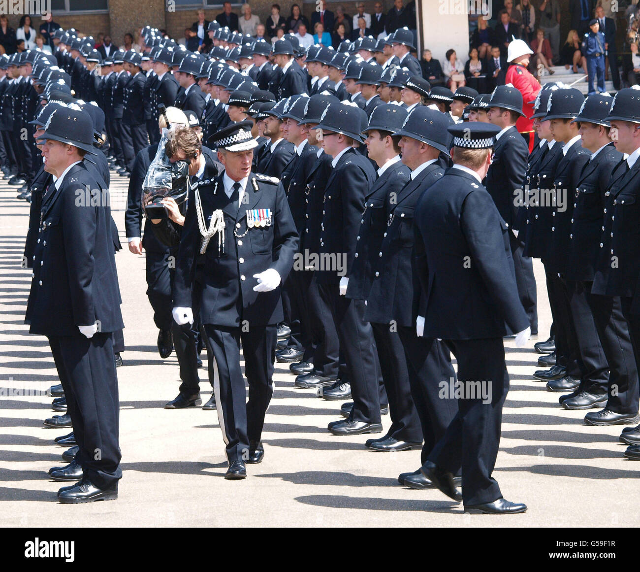 Police Commissioner Hogan-Howe reviews some of the newly graduated ...