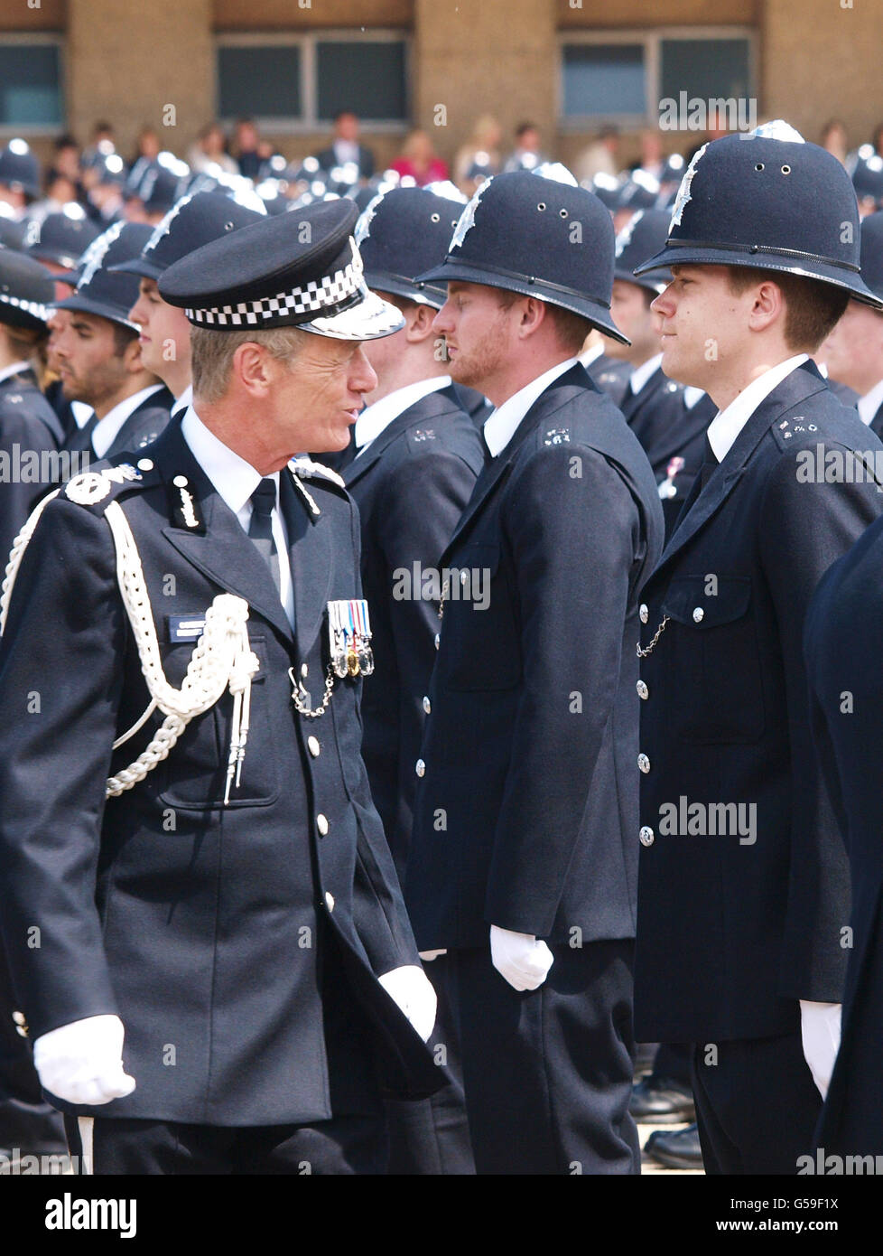 Police Commissioner Hogan-Howe reviews some of the newly graduated ...