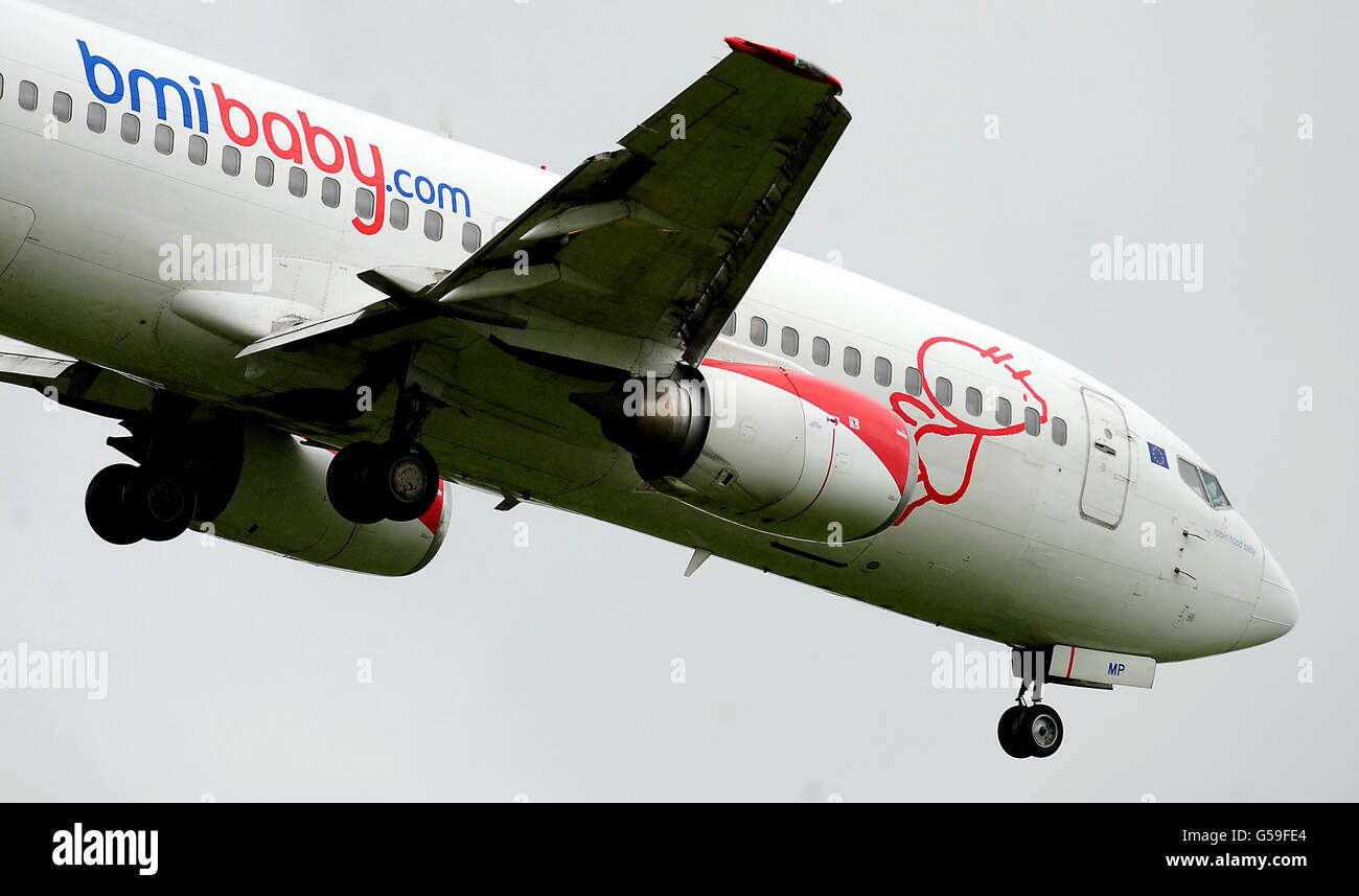 A BMI Baby plane lands at East Midlands Airport, Derbyshire Stock Photo ...