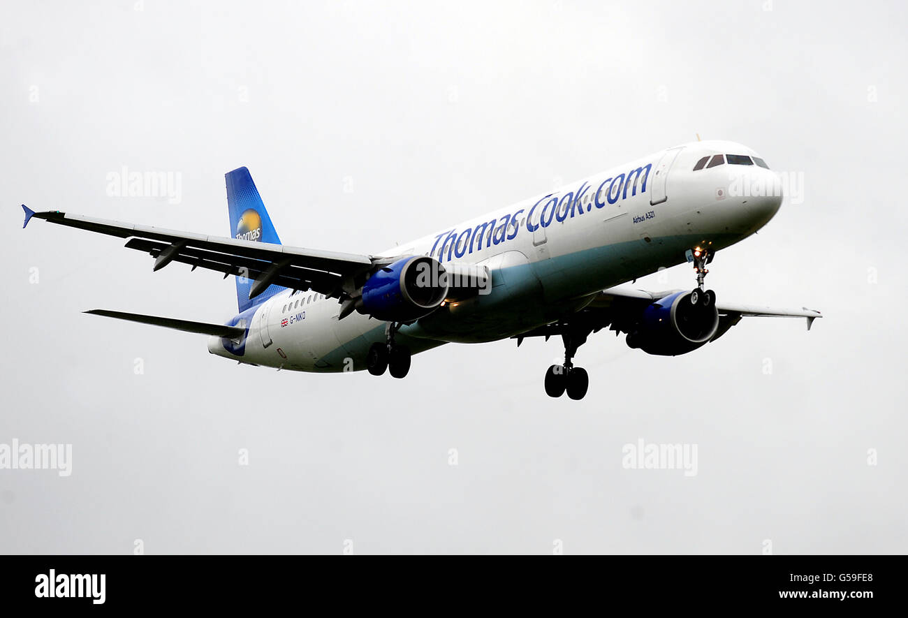A Thomas Cook plane lands at East Midlands Airport, Derbyshire Stock ...