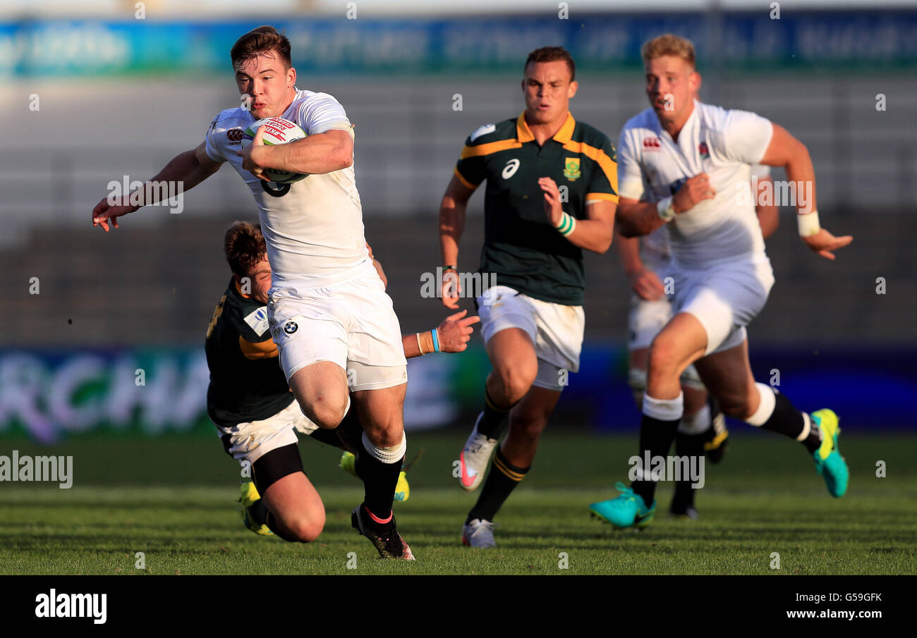 England's Matt Gallagher is tackled by South Africa's Marco Jansen van ...