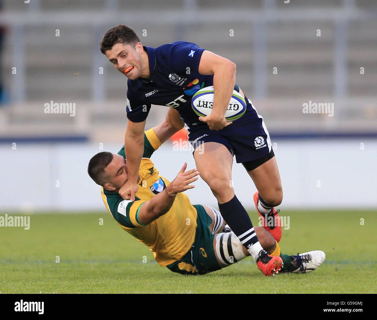 Scotland's Adam Hastings is tackled by Australia's Maclean Jones during ...