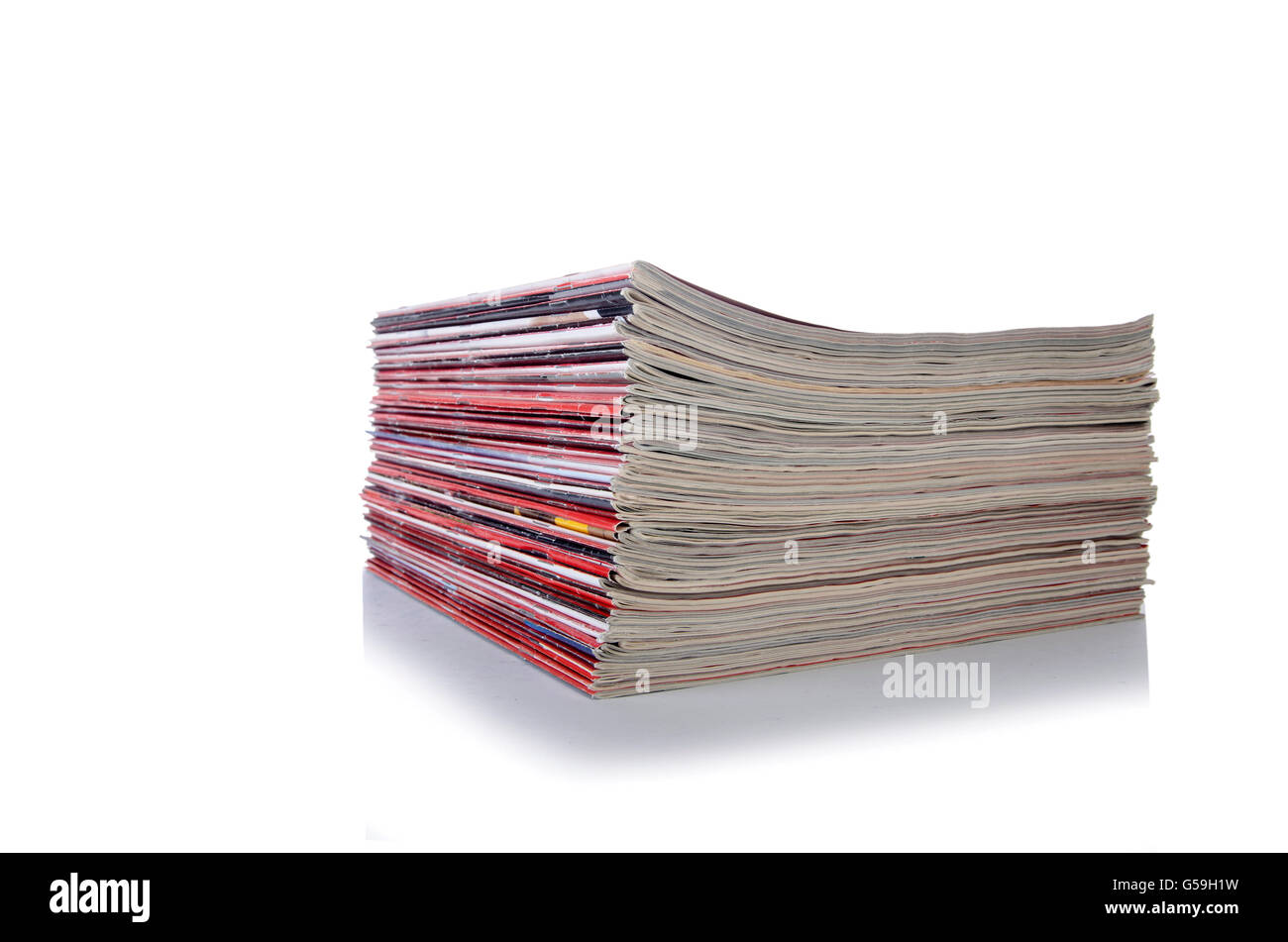 Stack of magazine isolated on the white background Stock Photo - Alamy