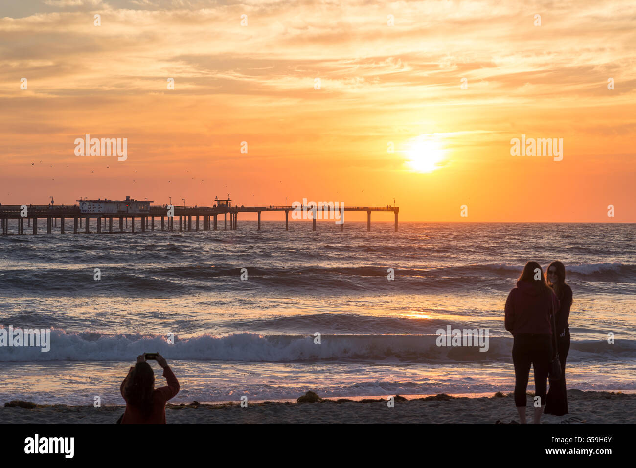 sunset, ocean, pier, beach. Ocean Beach, San Diego, California Stock ...