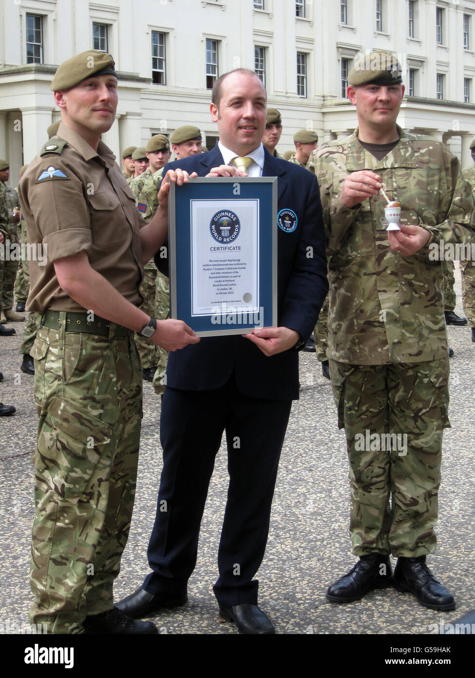 Major Guy Lock, Company Commander (left) Gareth Deaves from Guinness ...