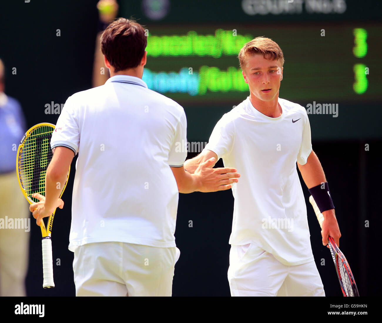 Great Britain's Oliver Golding (left) and Liam Broady during their ...