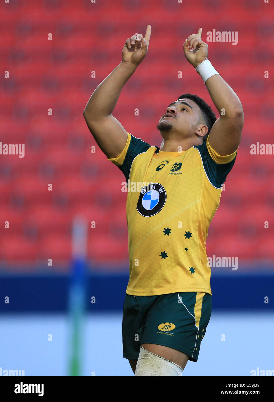 Australia's Sione Tuipolotu celebrates after scoring a try against ...