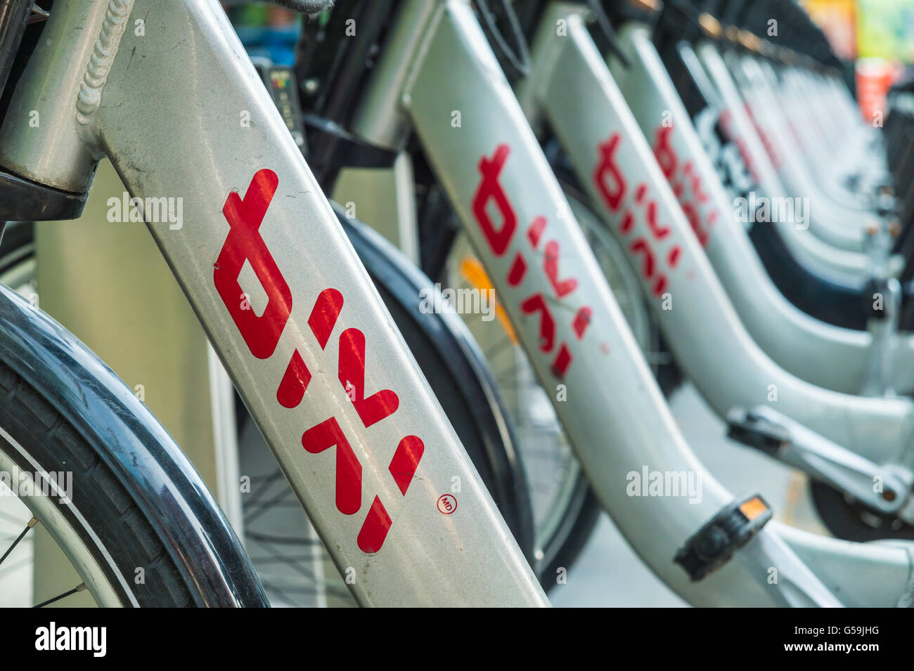 Row of parked rental bikes hi-res stock photography and images - Alamy