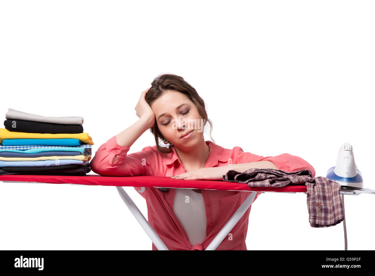 Young woman doing ironing isolated on white Stock Photo - Alamy