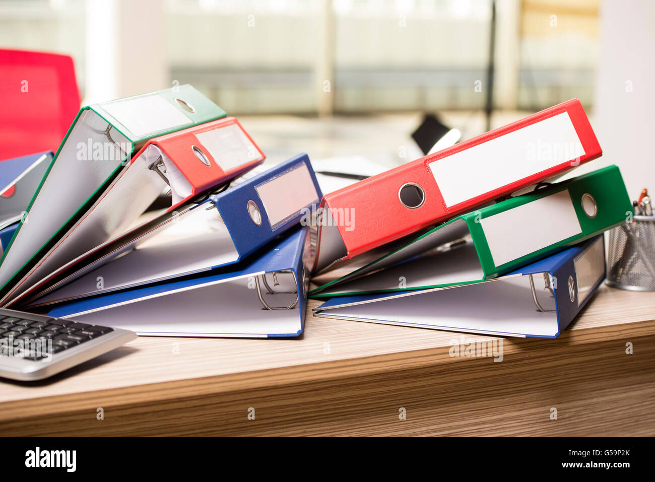 Stacks of office binders on desk Stock Photo - Alamy