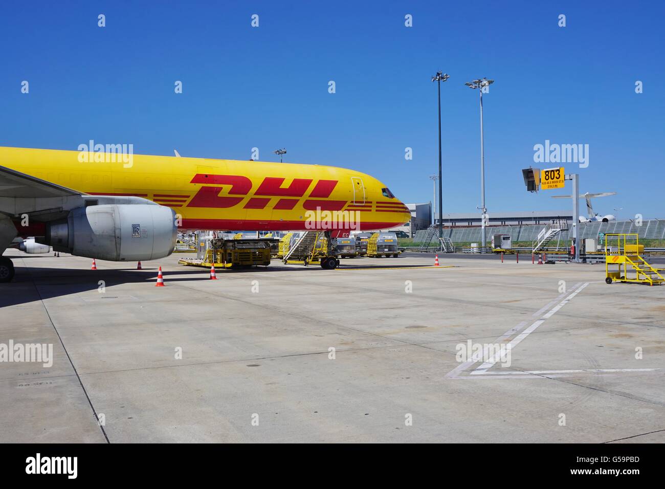 A yellow and red Boeing 757 airplane from international shipping ...