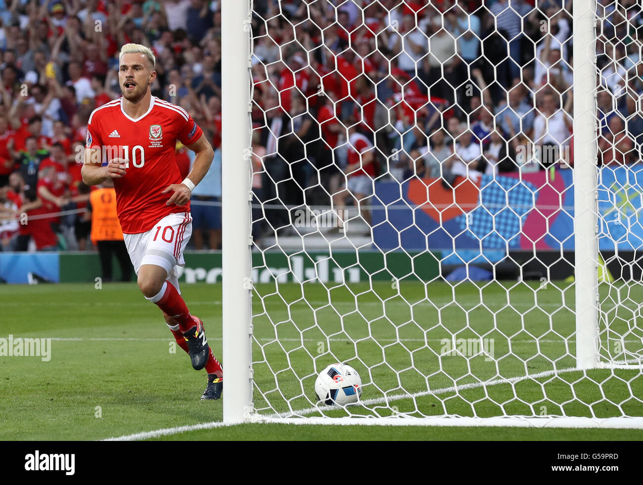 Wales' Aaron Ramsey celebrates scoring his side's first goal of the ...