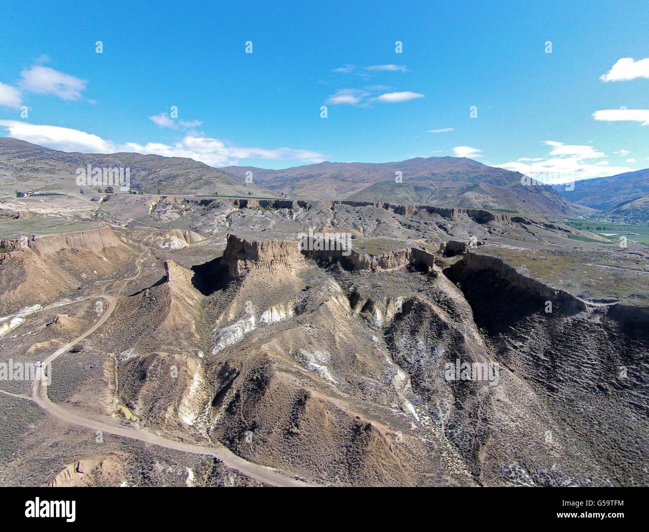 Walking track through historic gold sluicings, Bannockburn, near Cromwell, Central Otago, South ...