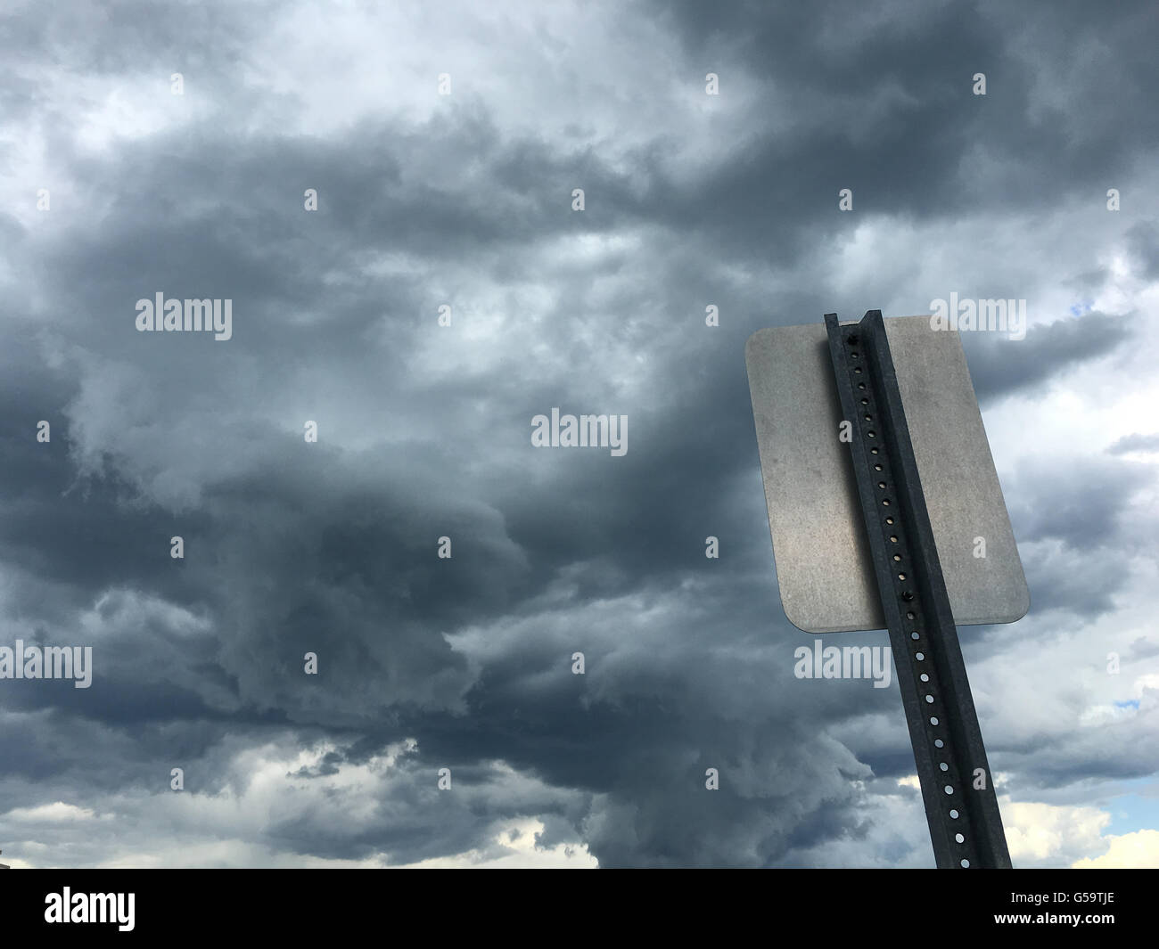 rear of traffic sign on cloud sky Stock Photo - Alamy
