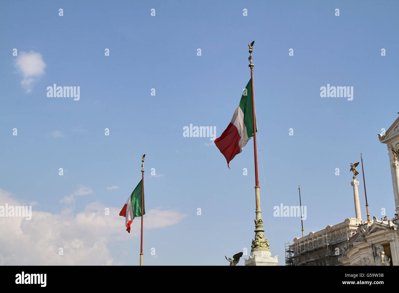 Italian flags at monument Stock Photo - Alamy