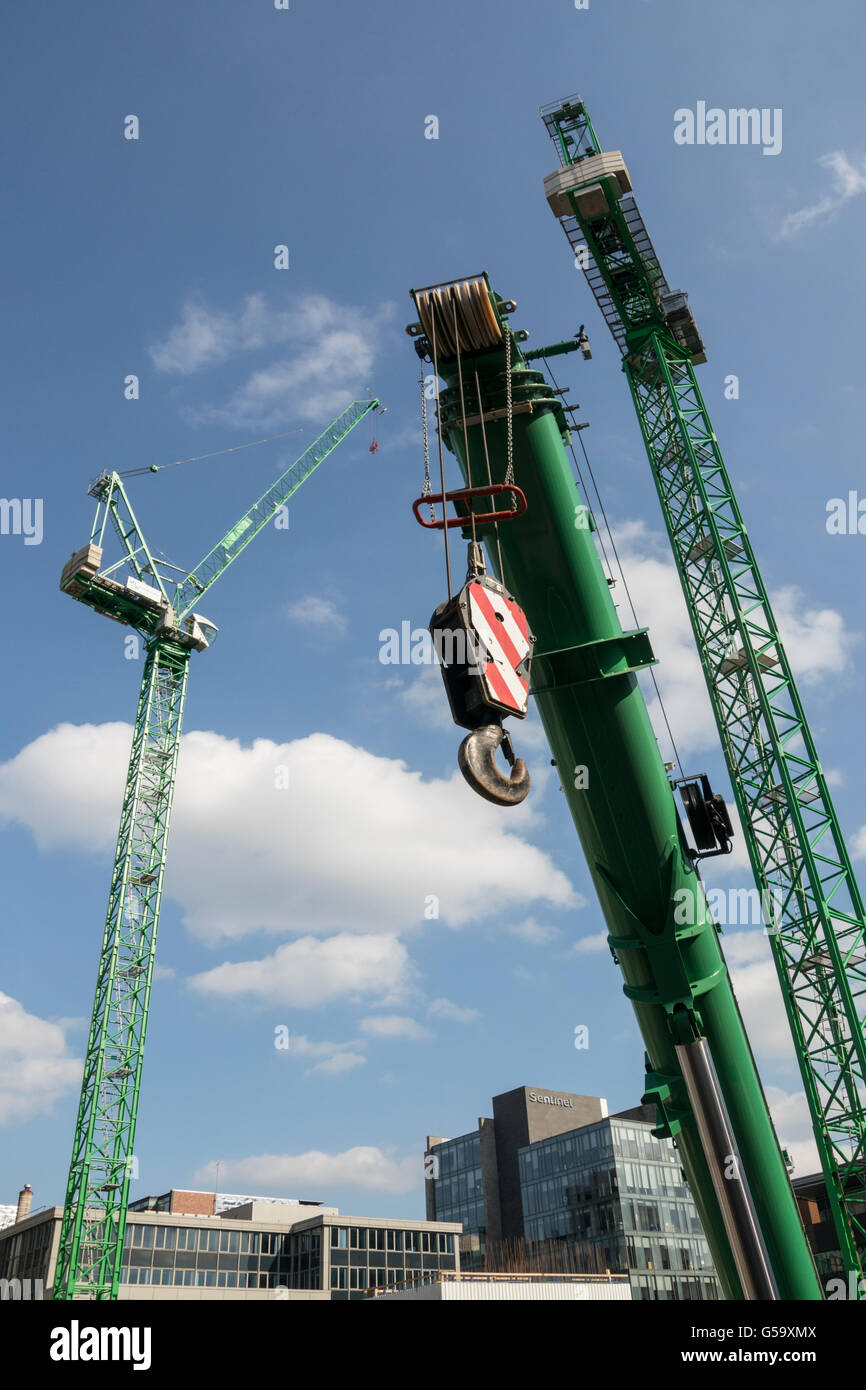 Construction tower cranes on site,Glasgow,Scotland,UK Stock Photo - Alamy