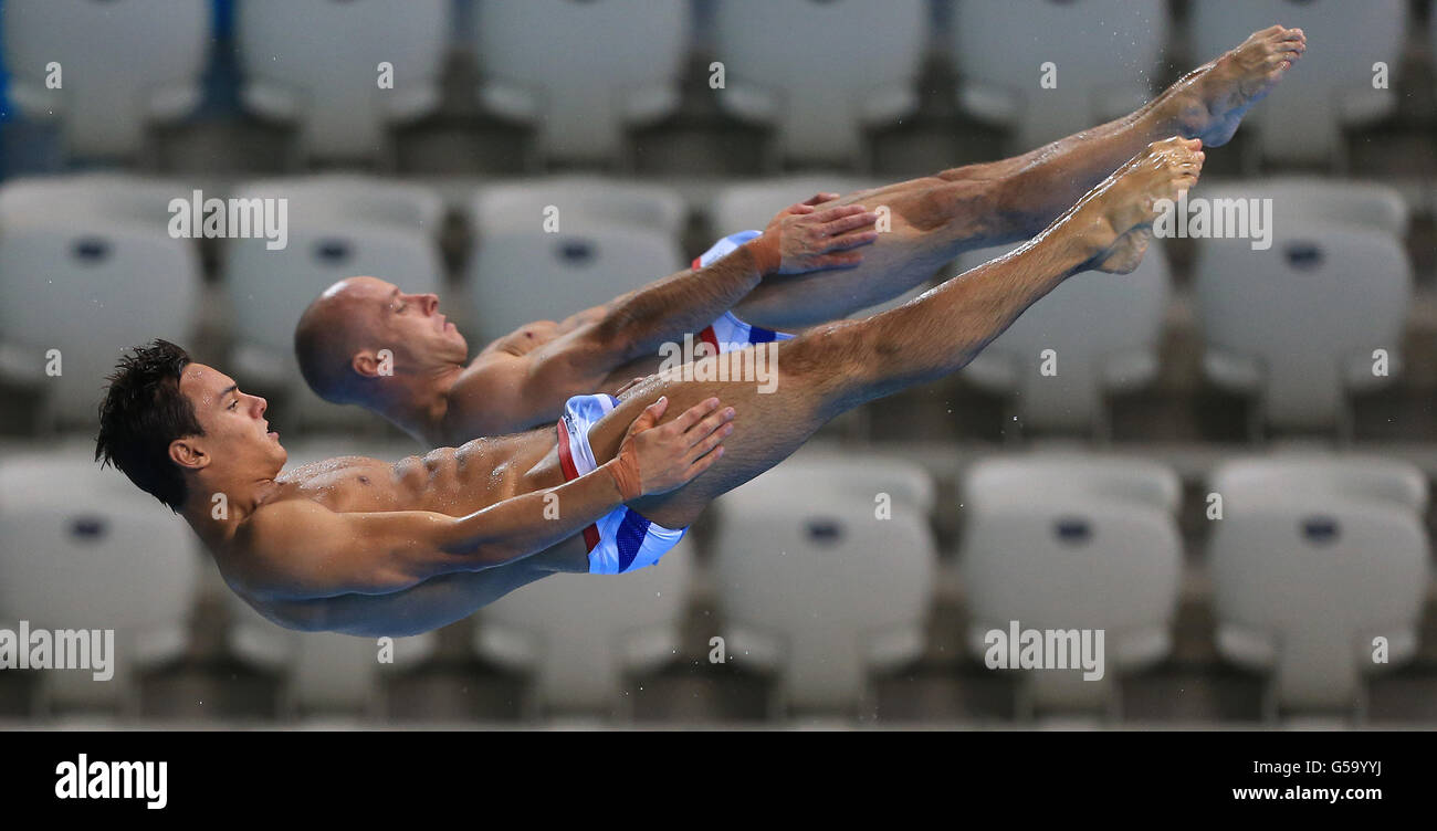 Great Britain's Tom Daley (left) practices his diving routine with ...