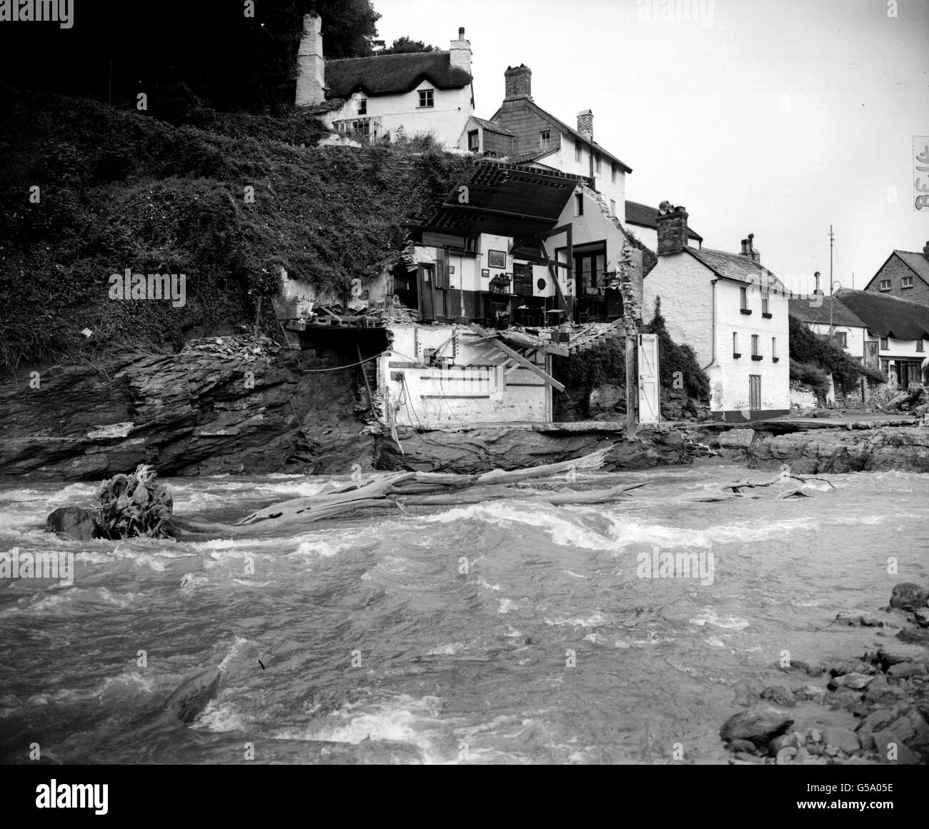 Devastating flood natural disaster Black and White Stock Photos ...