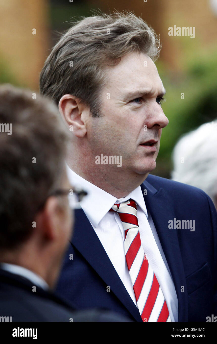 Stephen Rae, editor of the Evening Herald, attends the funeral of ...