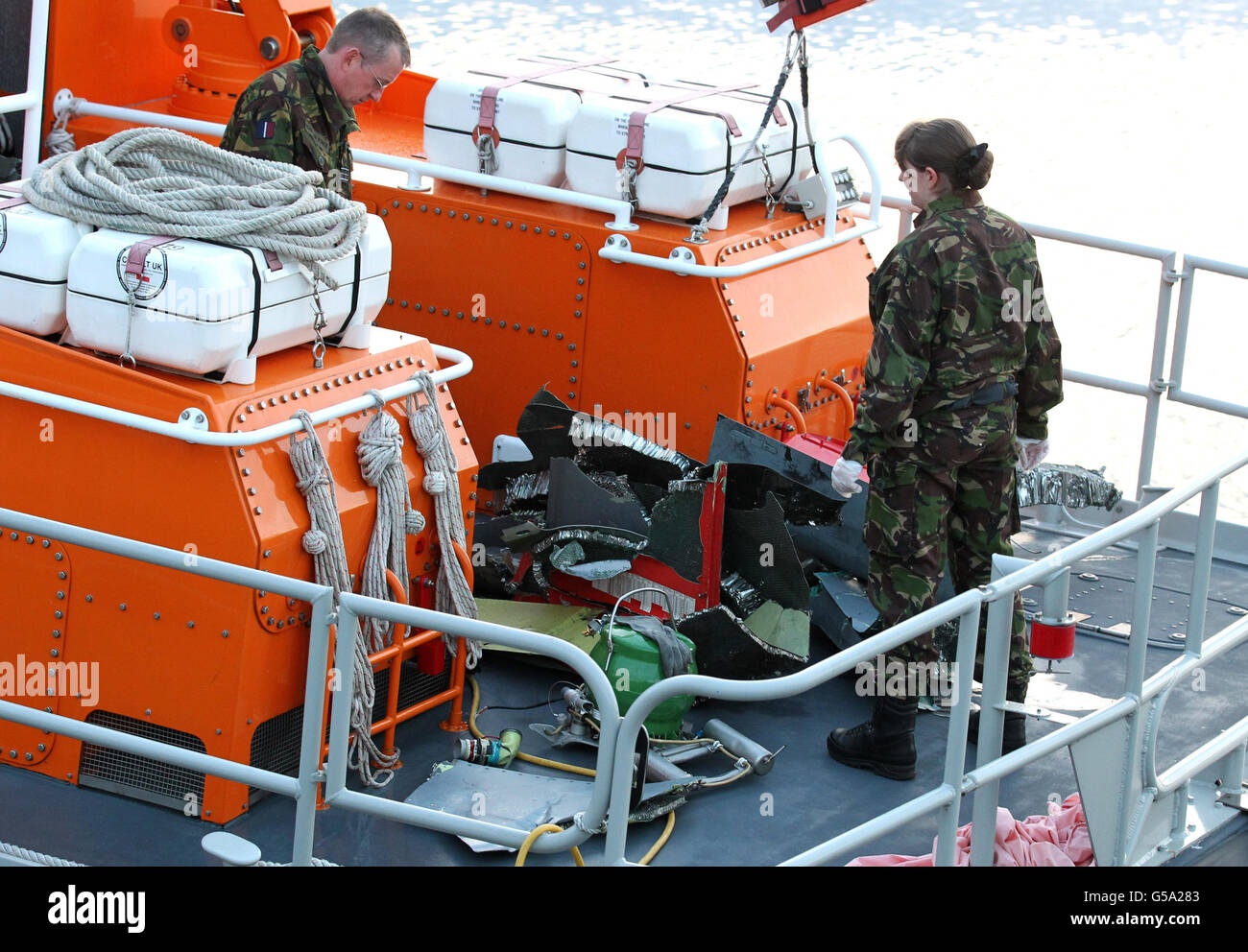Plane wreckage is on Buckie lifeboat after it arrived back in Buckie ...