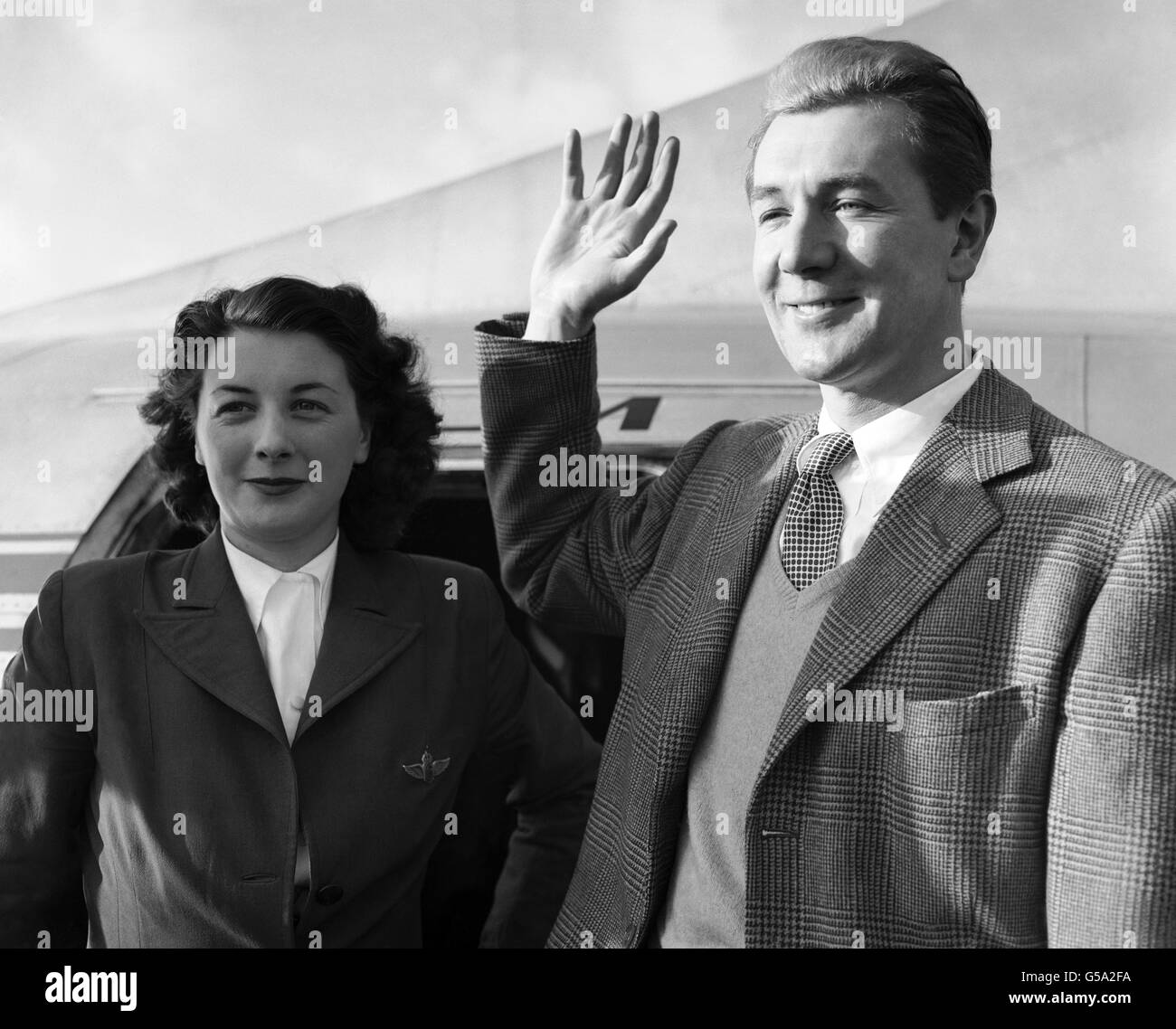 A wave from film actor michael redgrave at heathrow airport hi-res ...