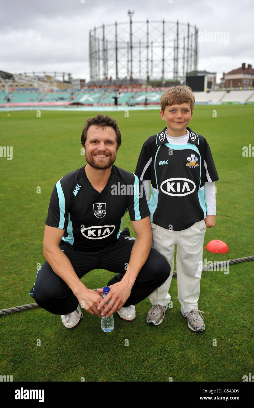 Surrey Lions head coach Chris Adams with the matchday mascot Stock ...