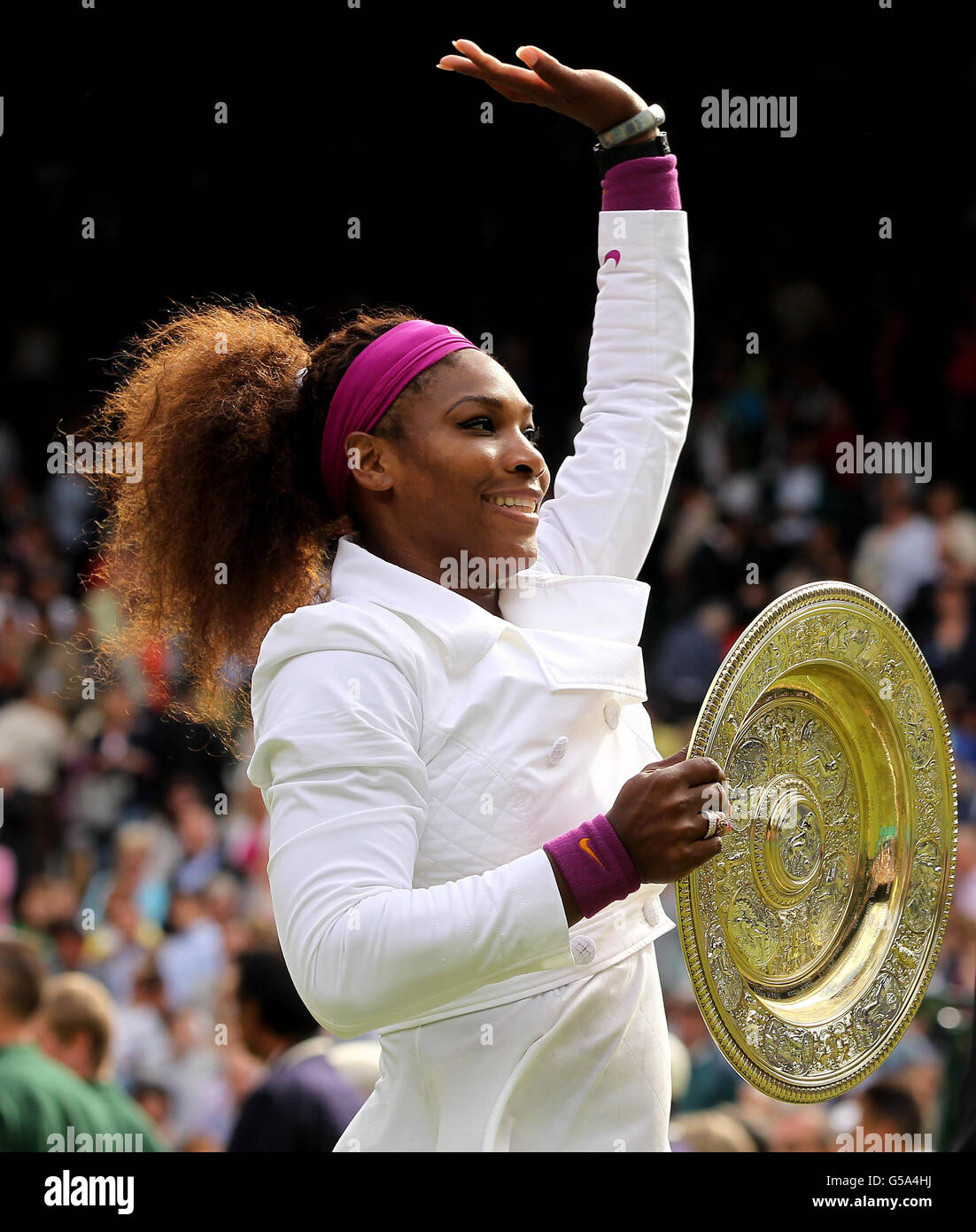 The USA's Serena Williams celebrates with the trophy after victory over ...
