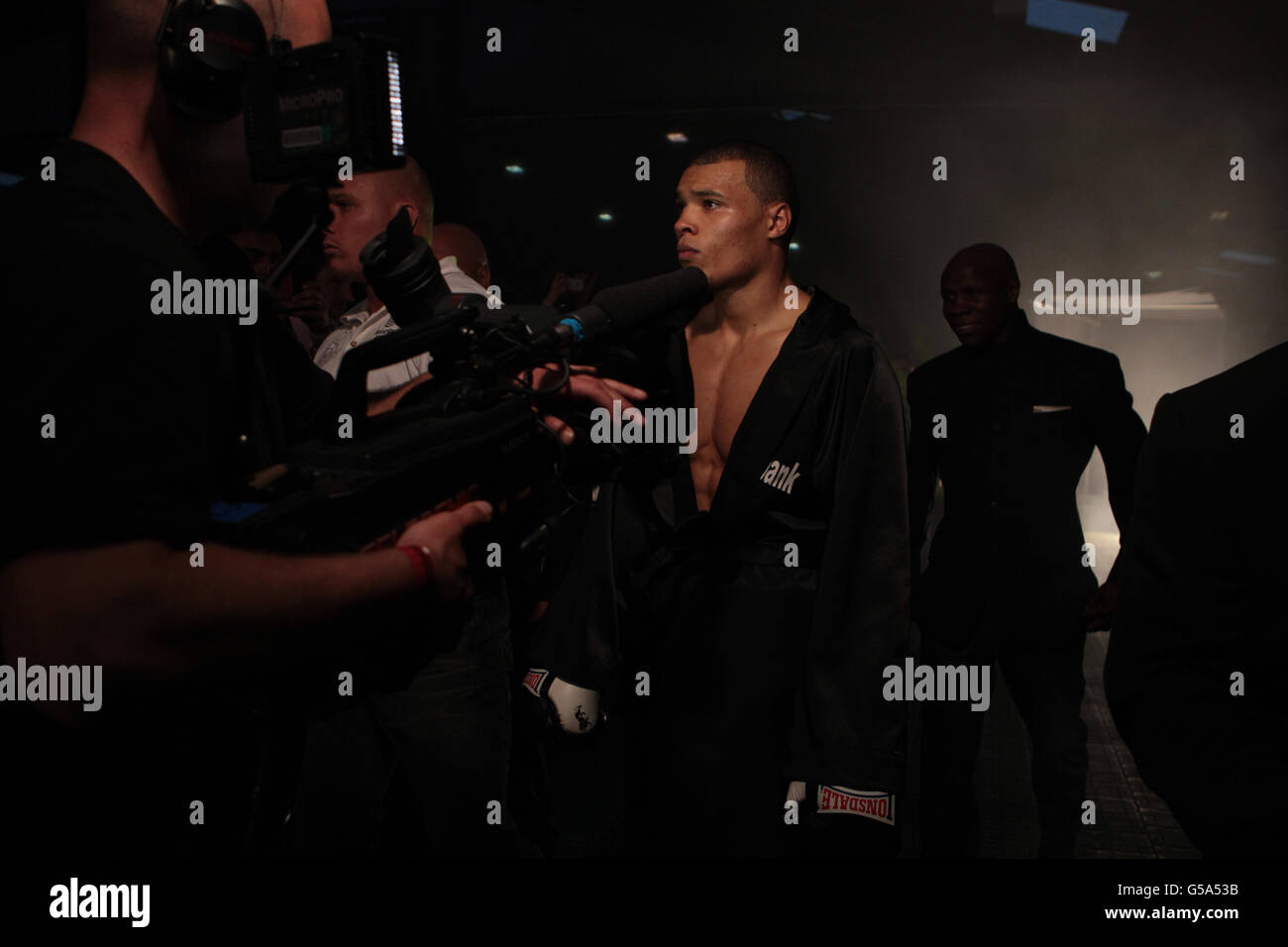 Chris Eubank Jnr makes his way to the ring with his Dad Chris Eubank ...