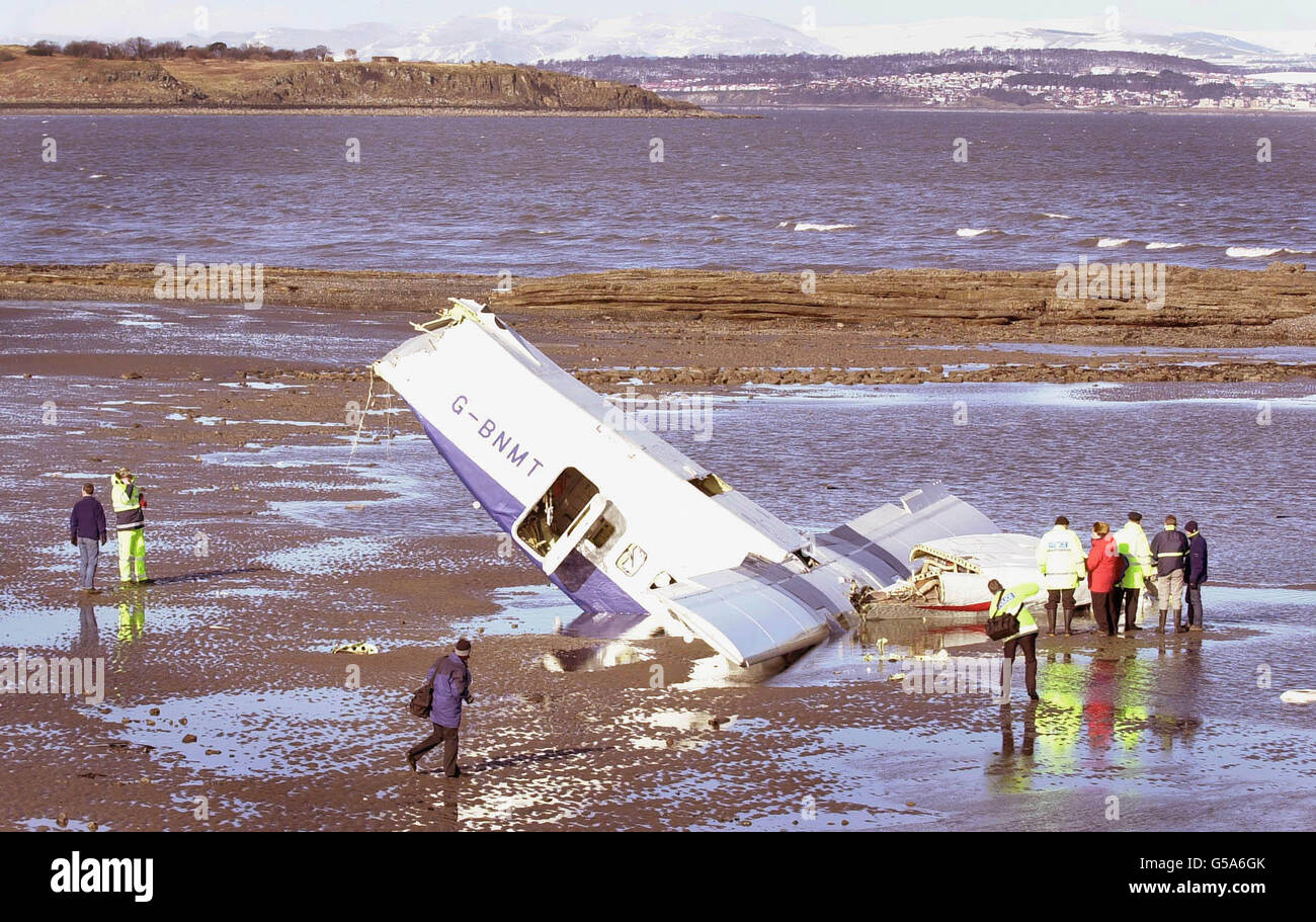 Inspecting crashed plane hi-res stock photography and images - Alamy