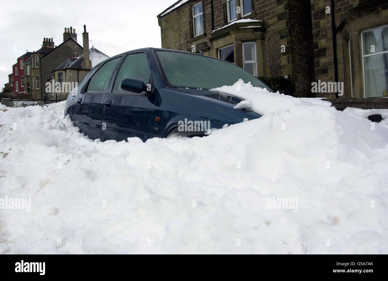 Heavy snow blocks roads in the Borders as thousands of Scottish homes ...