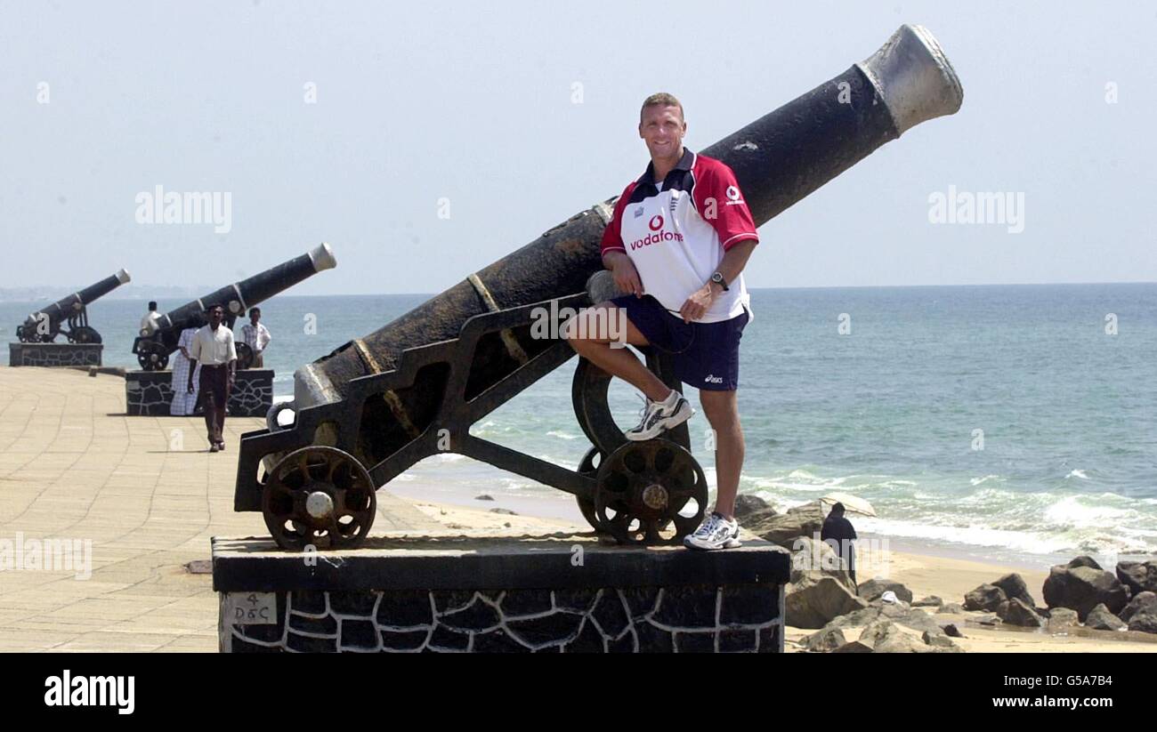 England wicket-keeper Alec Stewart poses for the cameras by a cannon ...