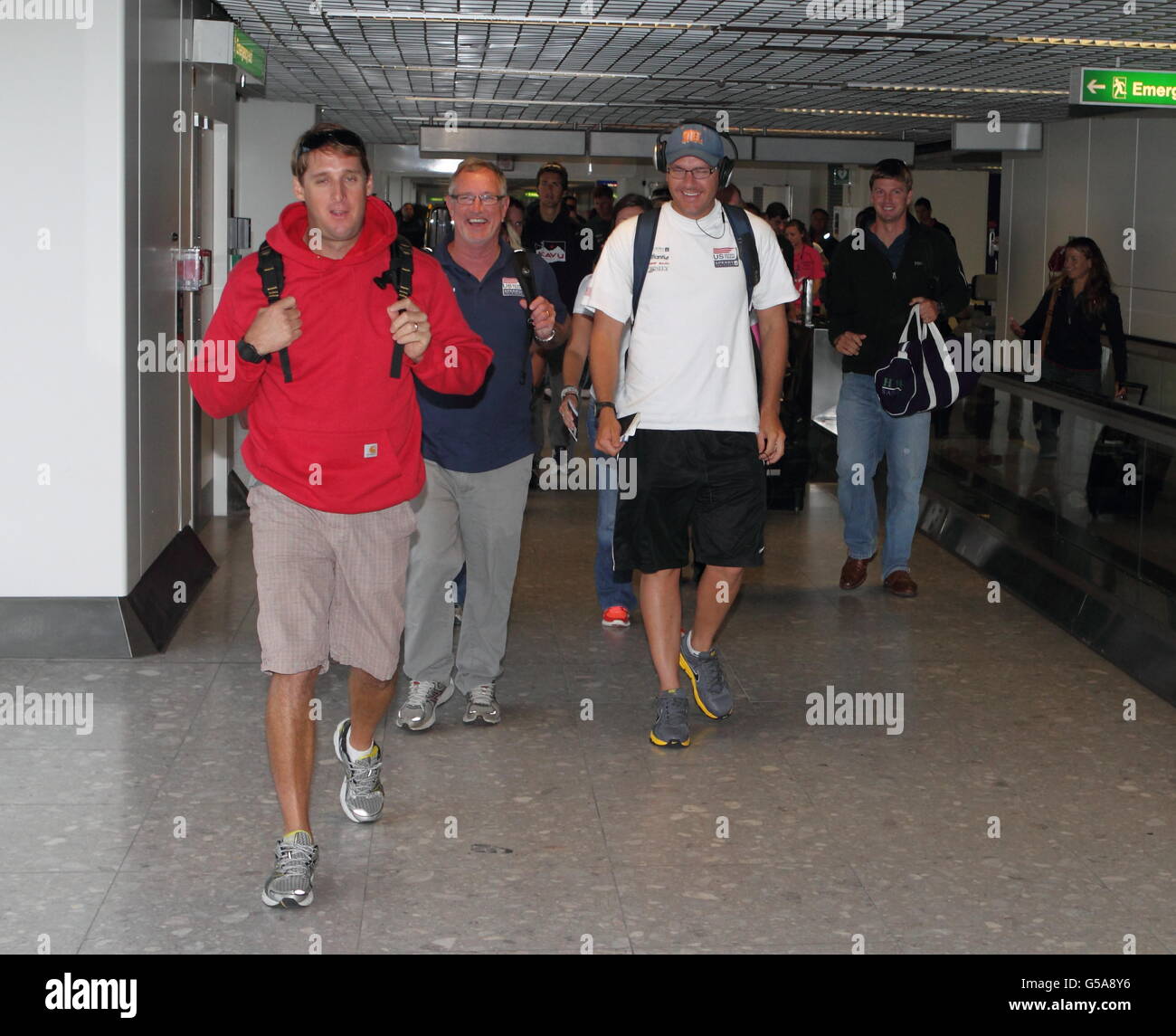 Members of the USA Olympic Team are met by LOCOG members as they arrive ...